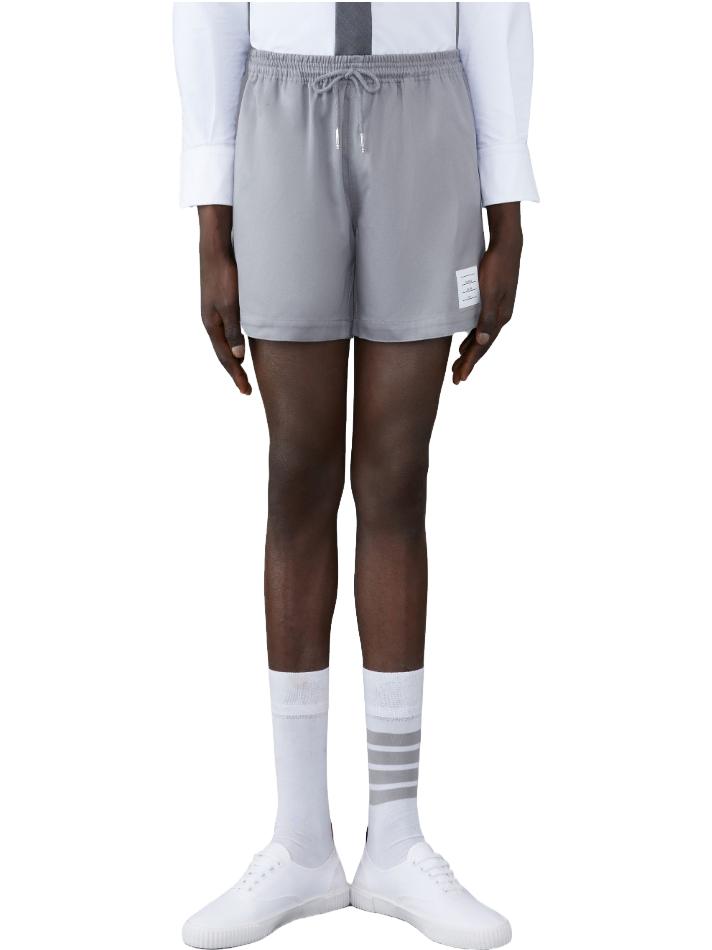 THOM BROWNE Thom Browne Grey Drawstring Shorts with Name Tag Decals